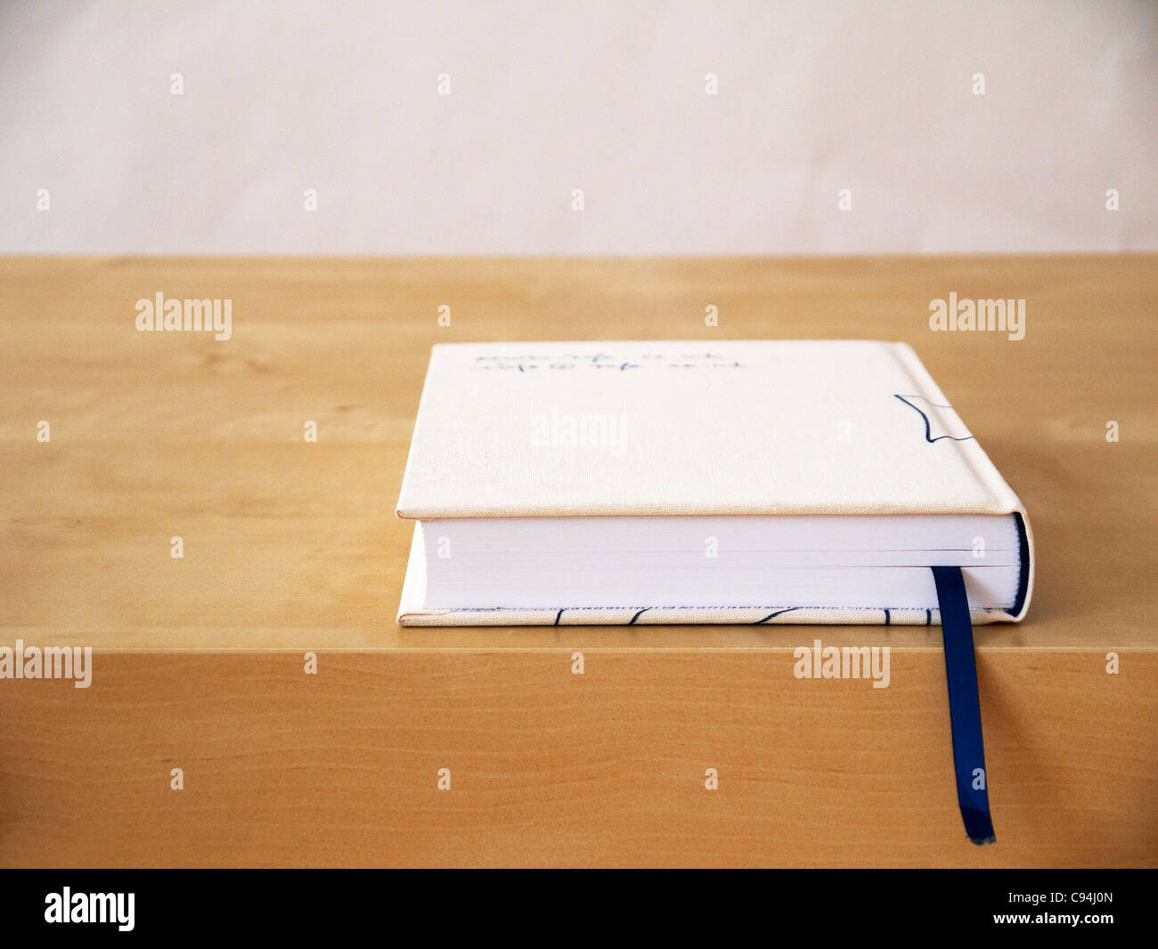 Book closed on table hi-res stock photography and images - Alamy
