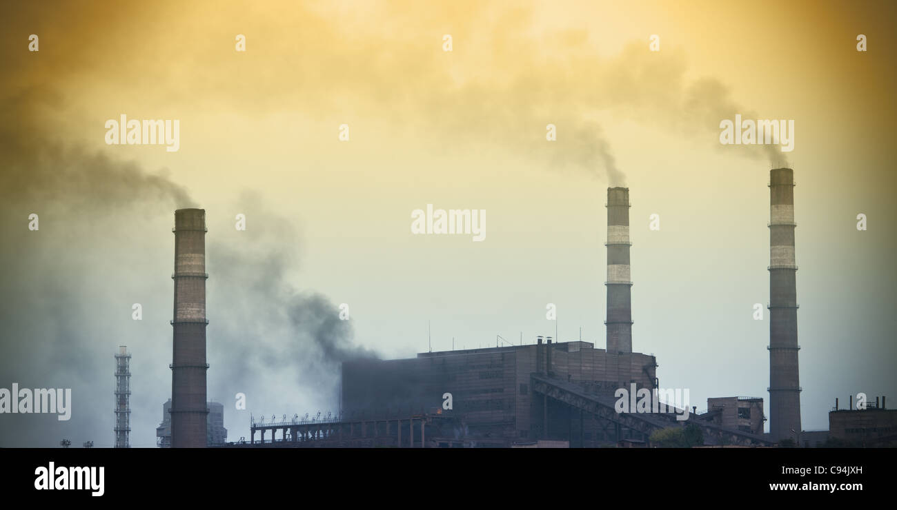 Power plant with yellow smoke Stock Photo - Alamy
