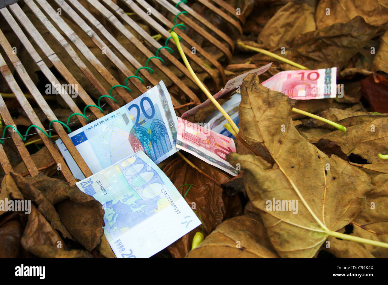 Raking Money High Resolution Stock Photography and Images - Alamy