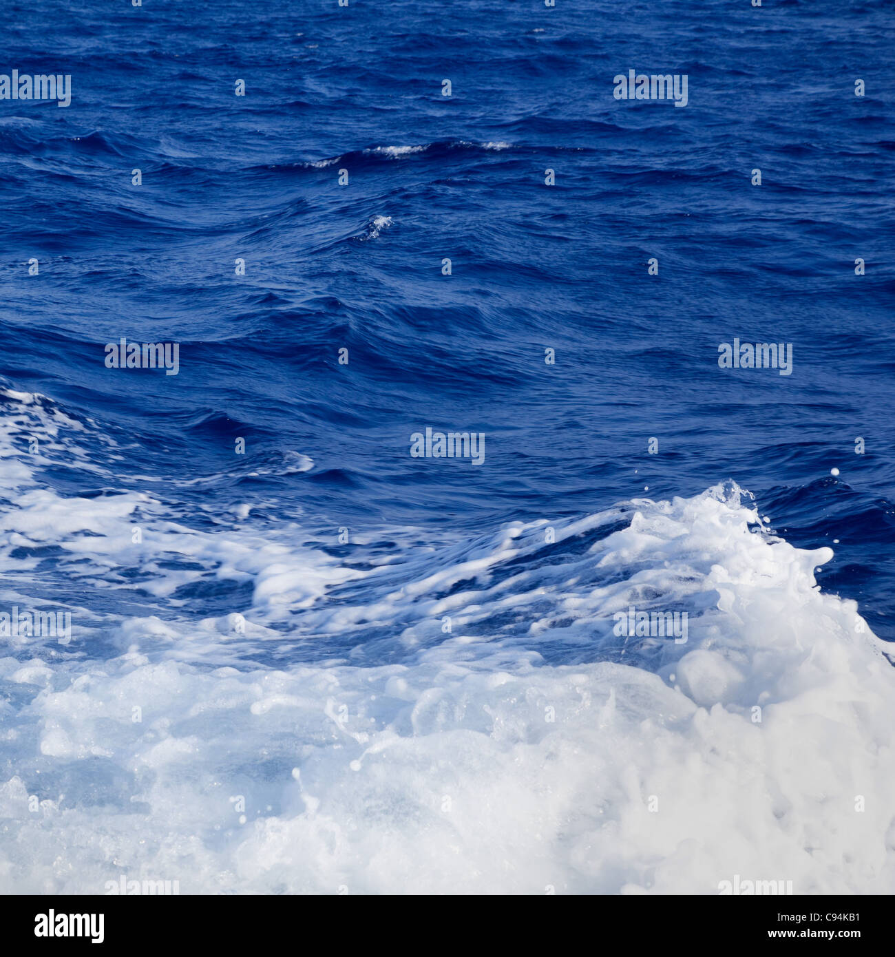 blue sea wave foam detail in square composition Stock Photo - Alamy
