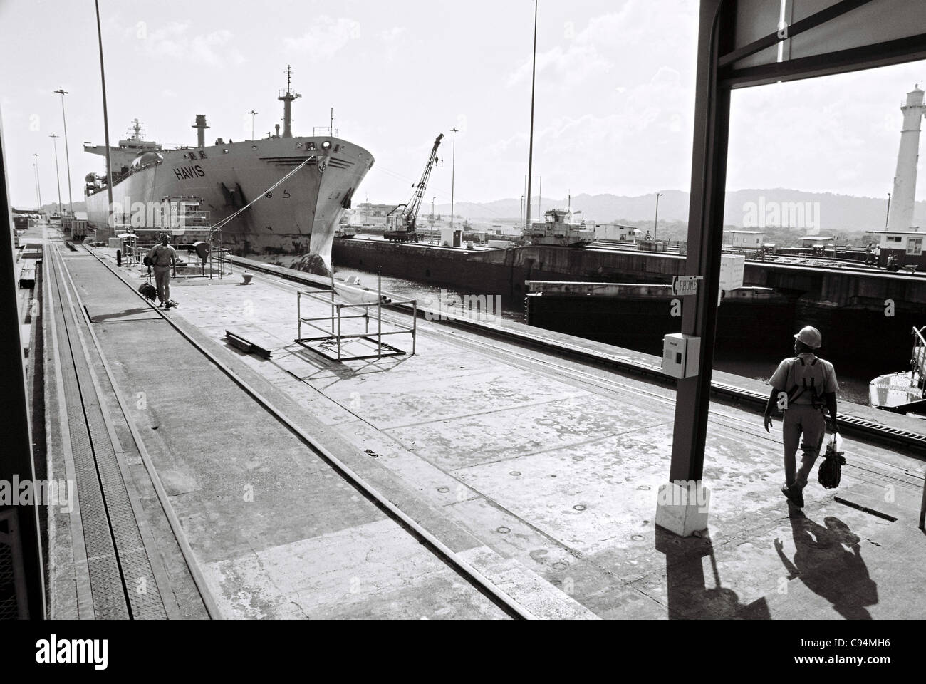 Ship being guided through the Gatun Lock chambers on the Caribbean side ...