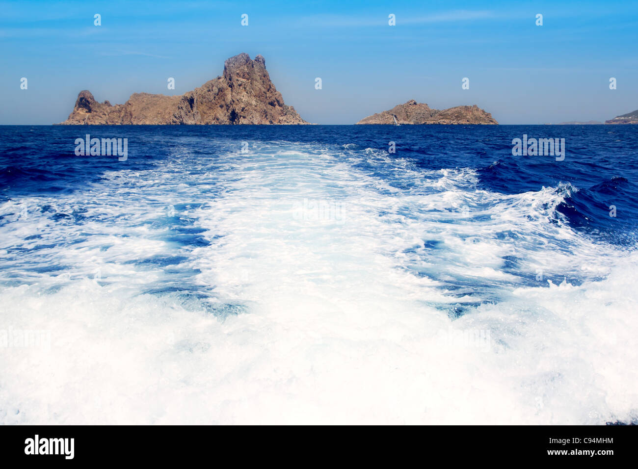 Ibiza Es Vedra from boat prop wash wake in Balearic Mediterranean sea ...