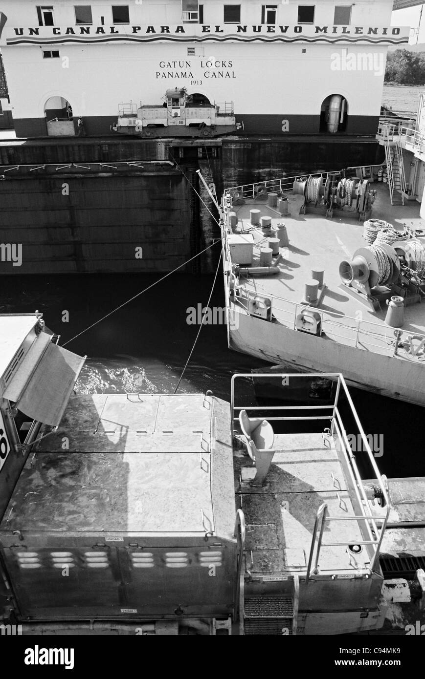 Ship being guided through the Gatun Lock chambers on the Caribbean side ...
