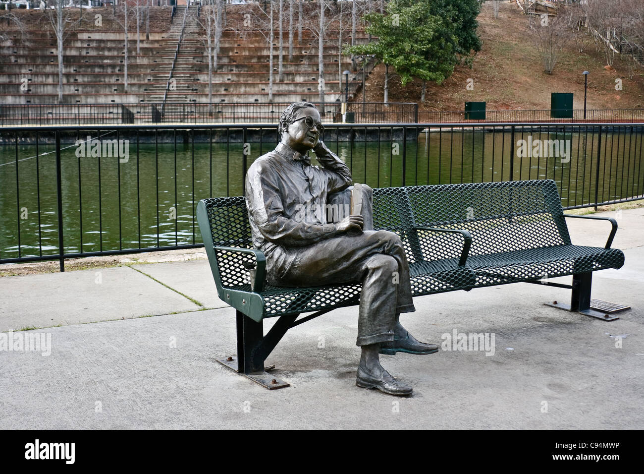 Statue Of A Man Resting Stock Photo - Alamy