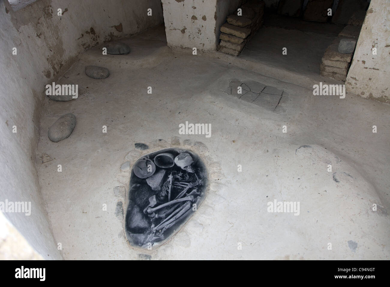 reconstruction of neolithic huts showing tomb, Khirokitia, Cyprus Stock ...