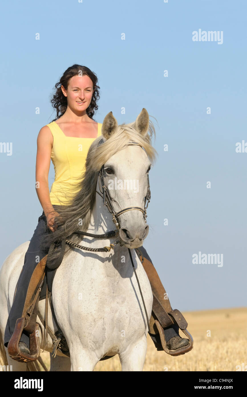 Horse Looking Back At Rider
