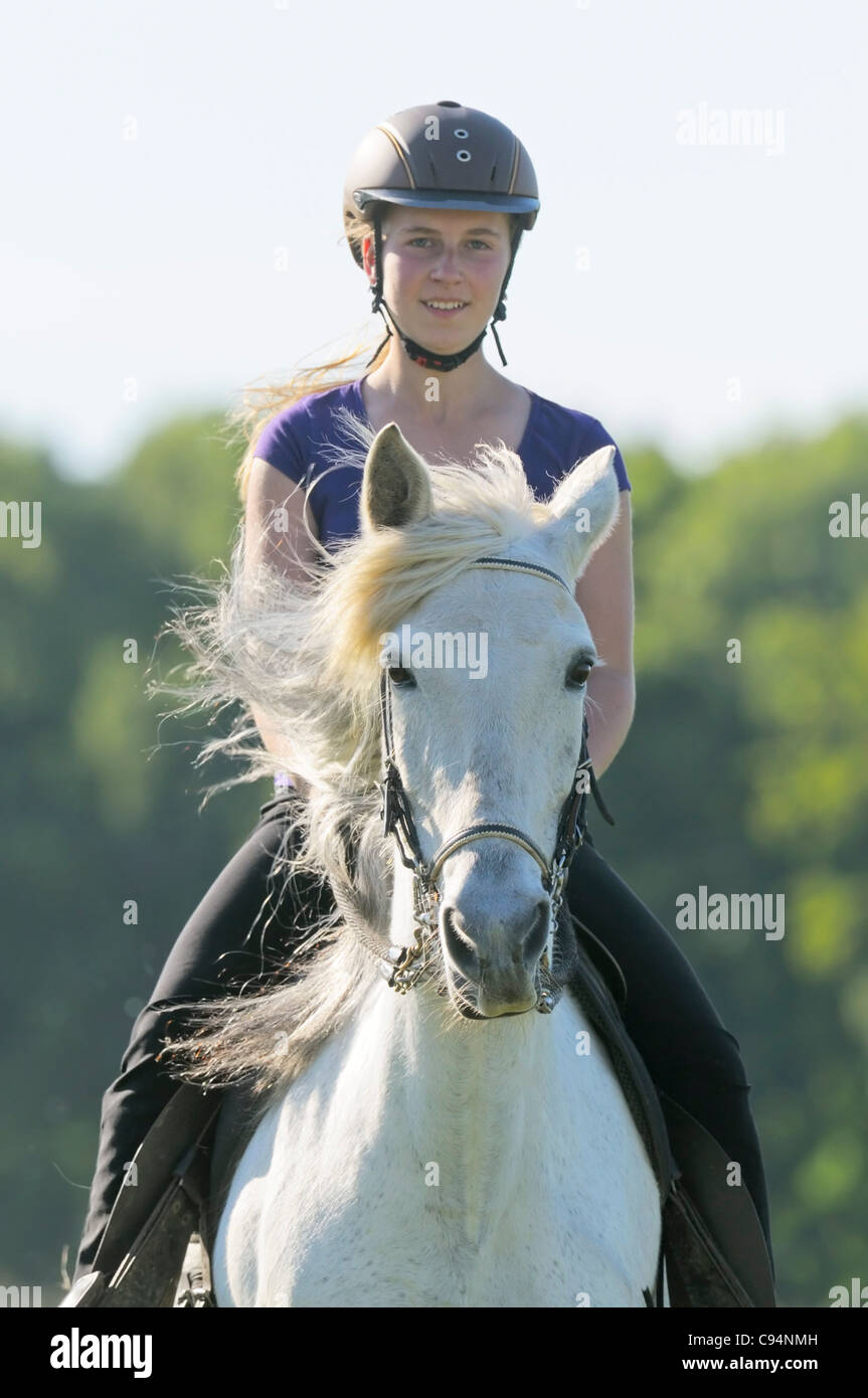 Teen girl riding horse hi-res stock photography and images - Alamy
