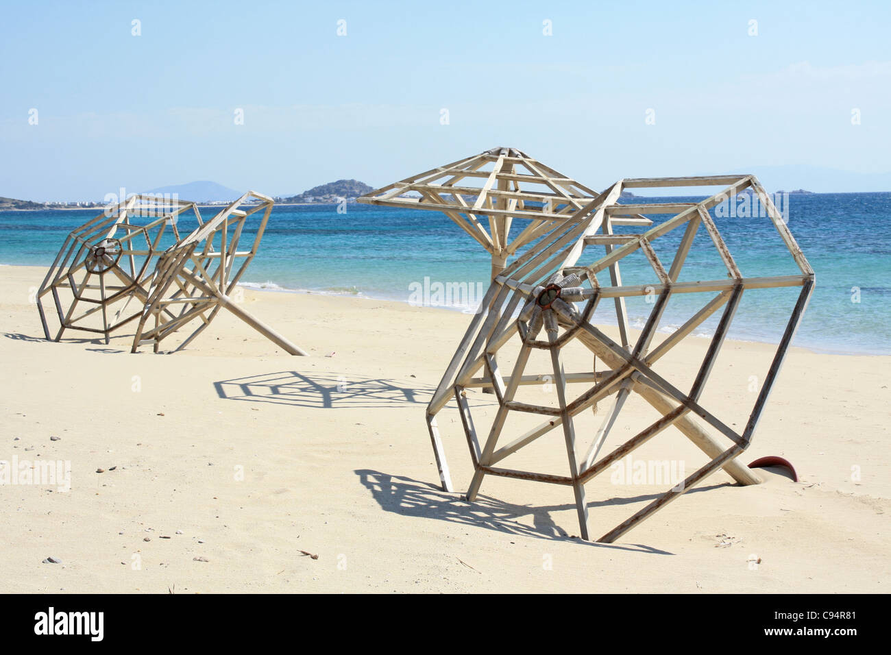 Parasol frame, beach in Paros, Greece Stock Photo - Alamy