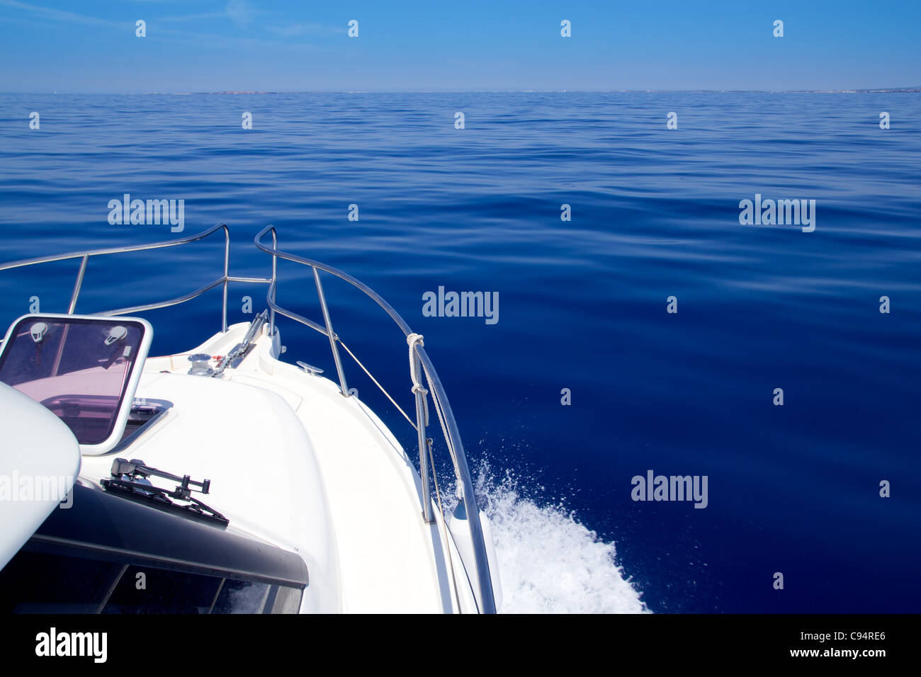 Boat bow open porthole sailing in blue calm sea during summer vacations ...