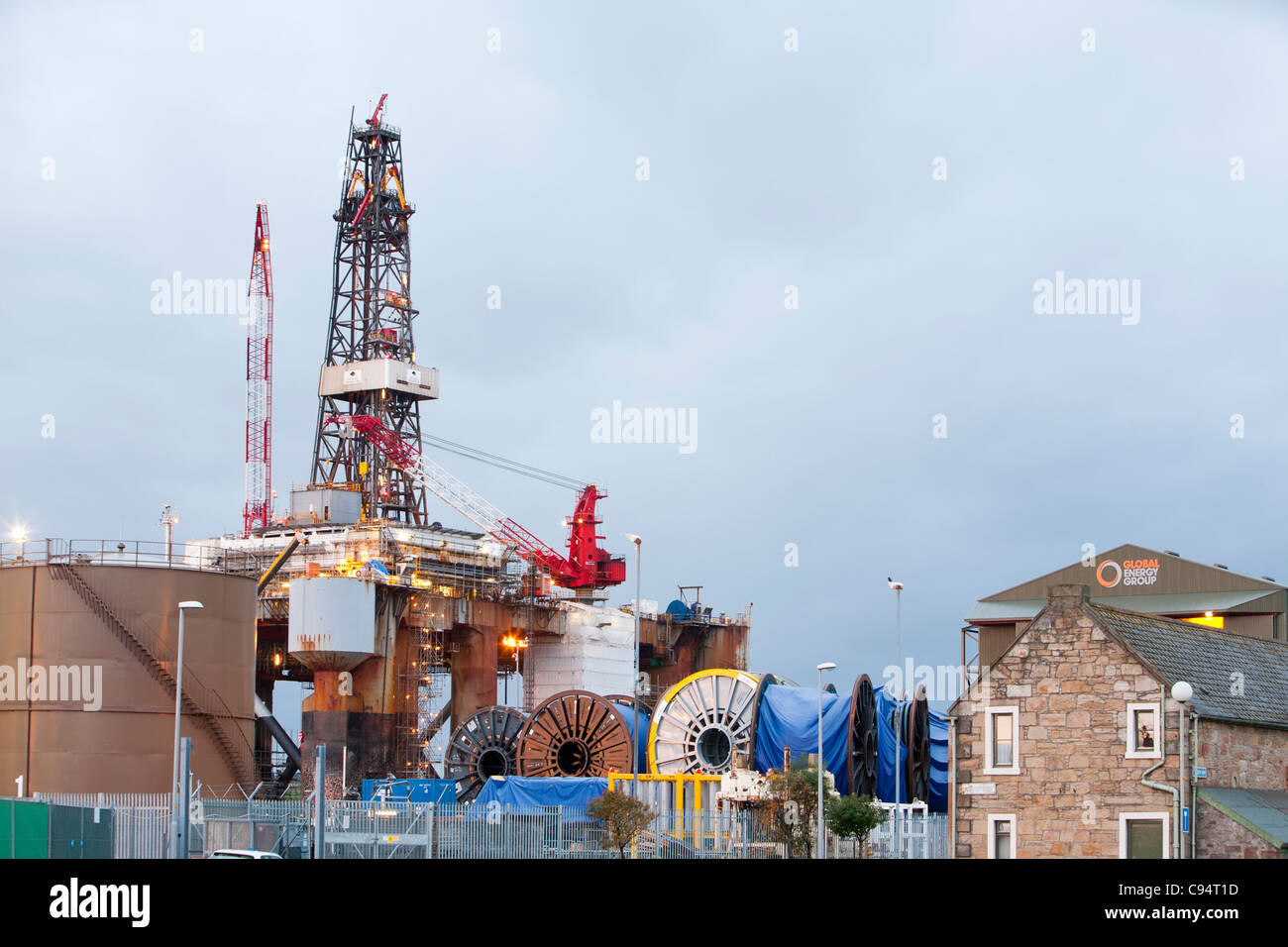 An oil rig being refitted at Invergordon in the Cromarty firth ...