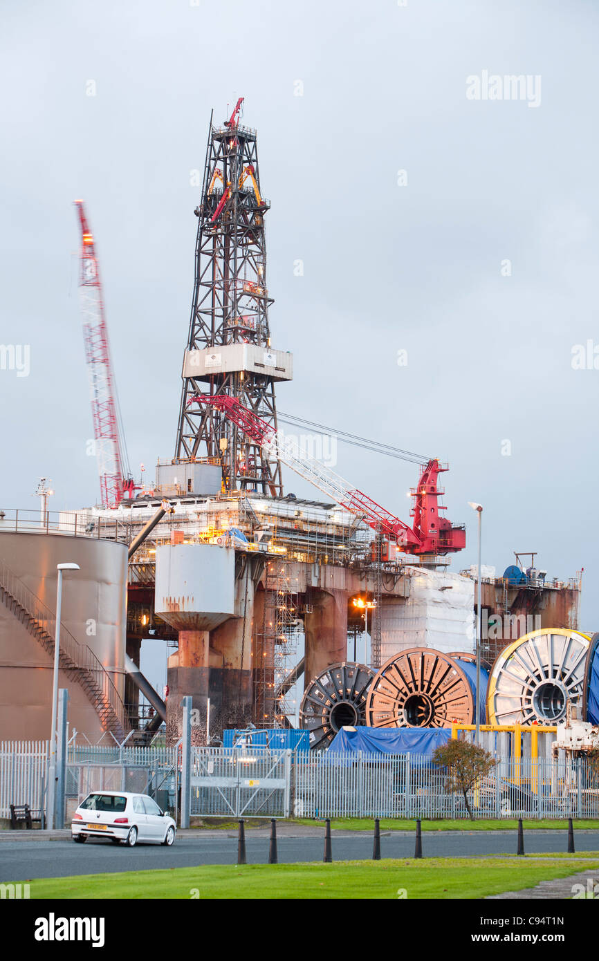 An oil rig being refitted at Invergordon in the Cromarty firth ...