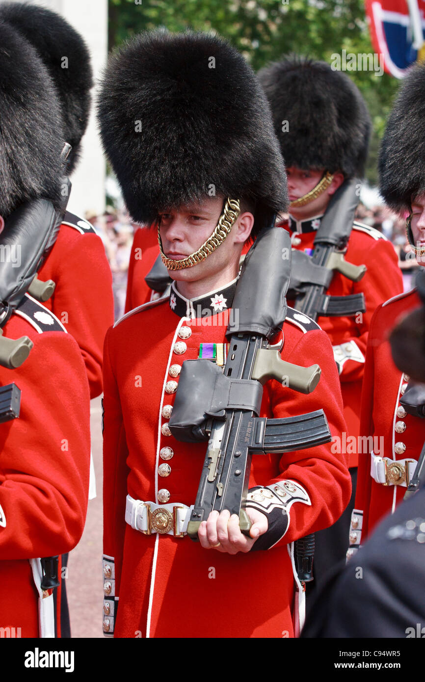 Members of the Coldstream Foot Guards on parade in front of Buckingham ...
