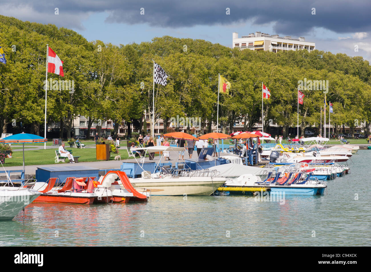 Hire boat vendor on the lake shore at Annecy Stock Photo - Alamy