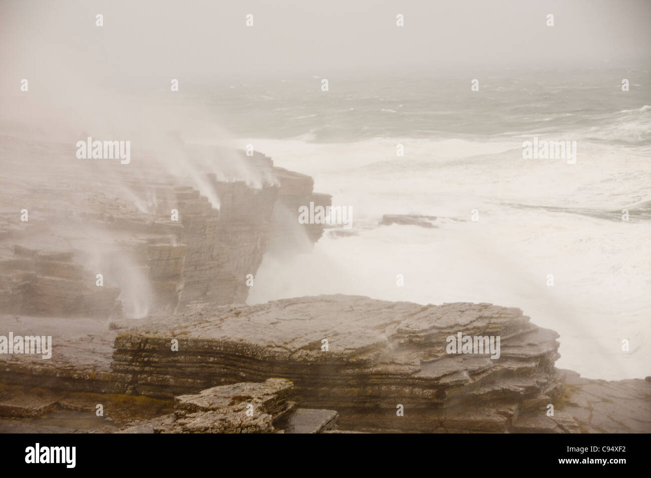 Storm driven waves crashing over 80 foot cliffs at Deerness on Orkney ...