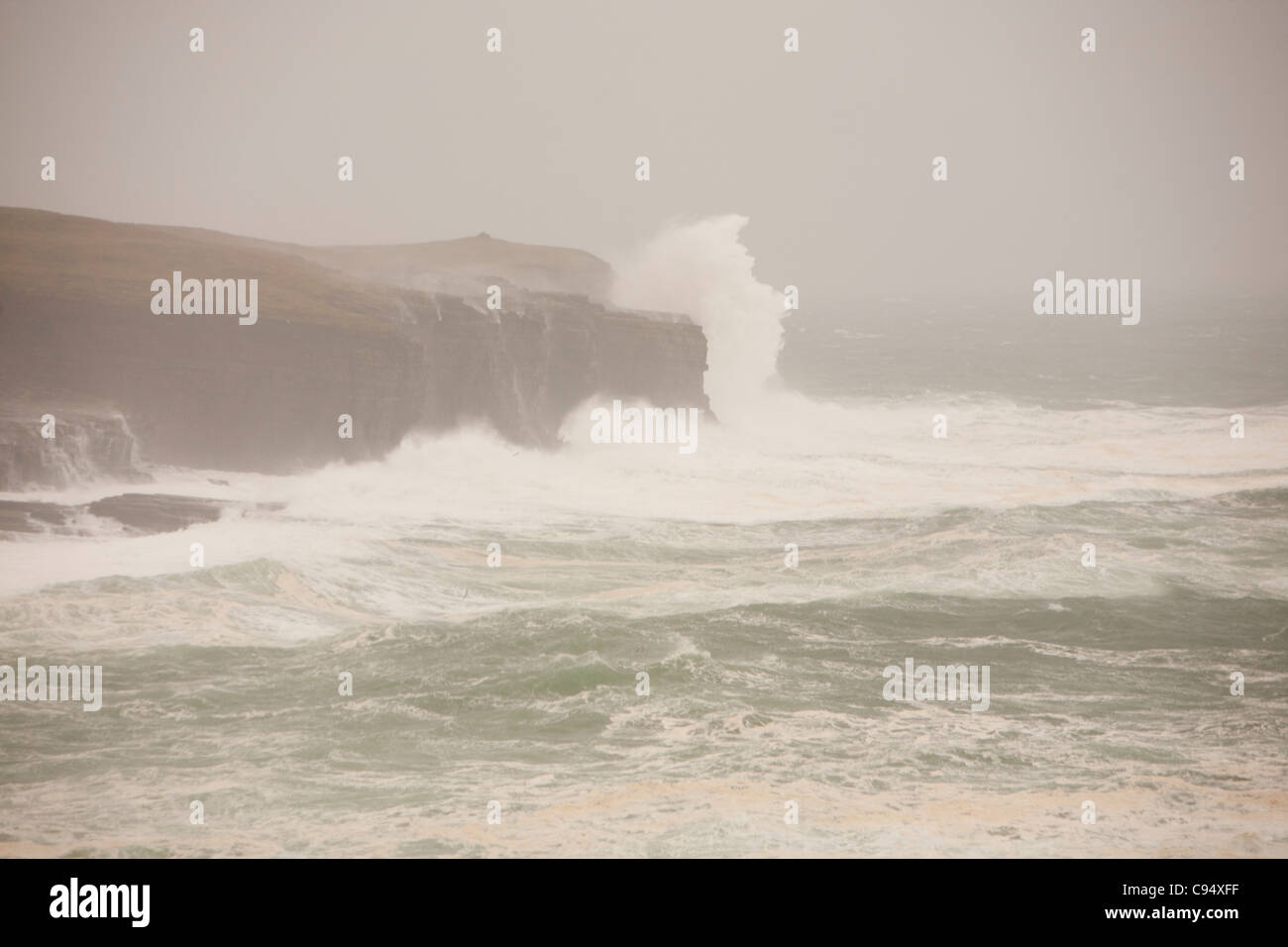 Storm driven waves crashing over 80 foot cliffs at Deerness on Orkney ...