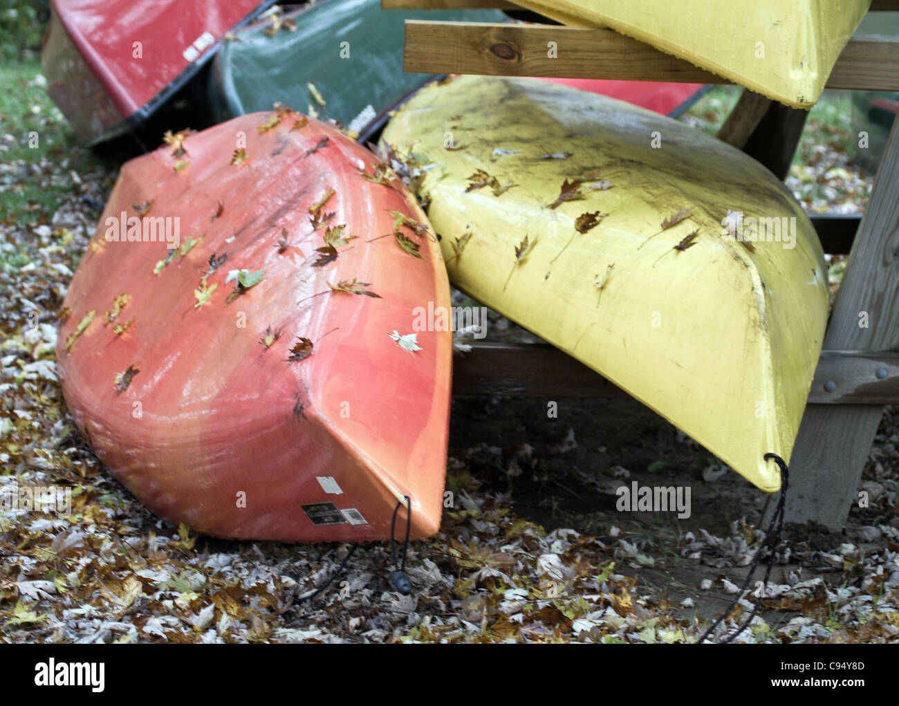 Stacked rowing boats in autumn hi-res stock photography and images - Alamy