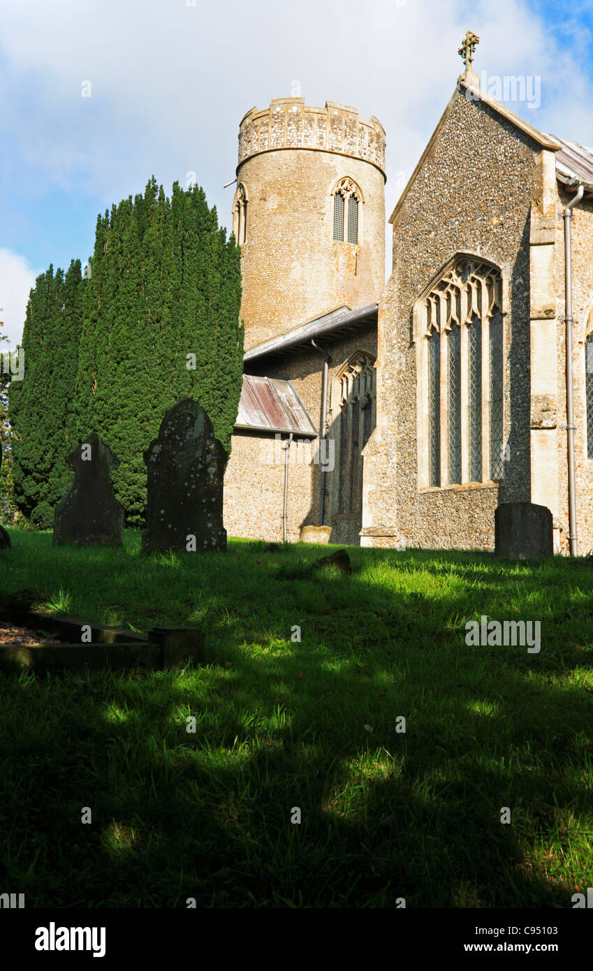 The round tower and south porch of the parish Church of St Mary at ...