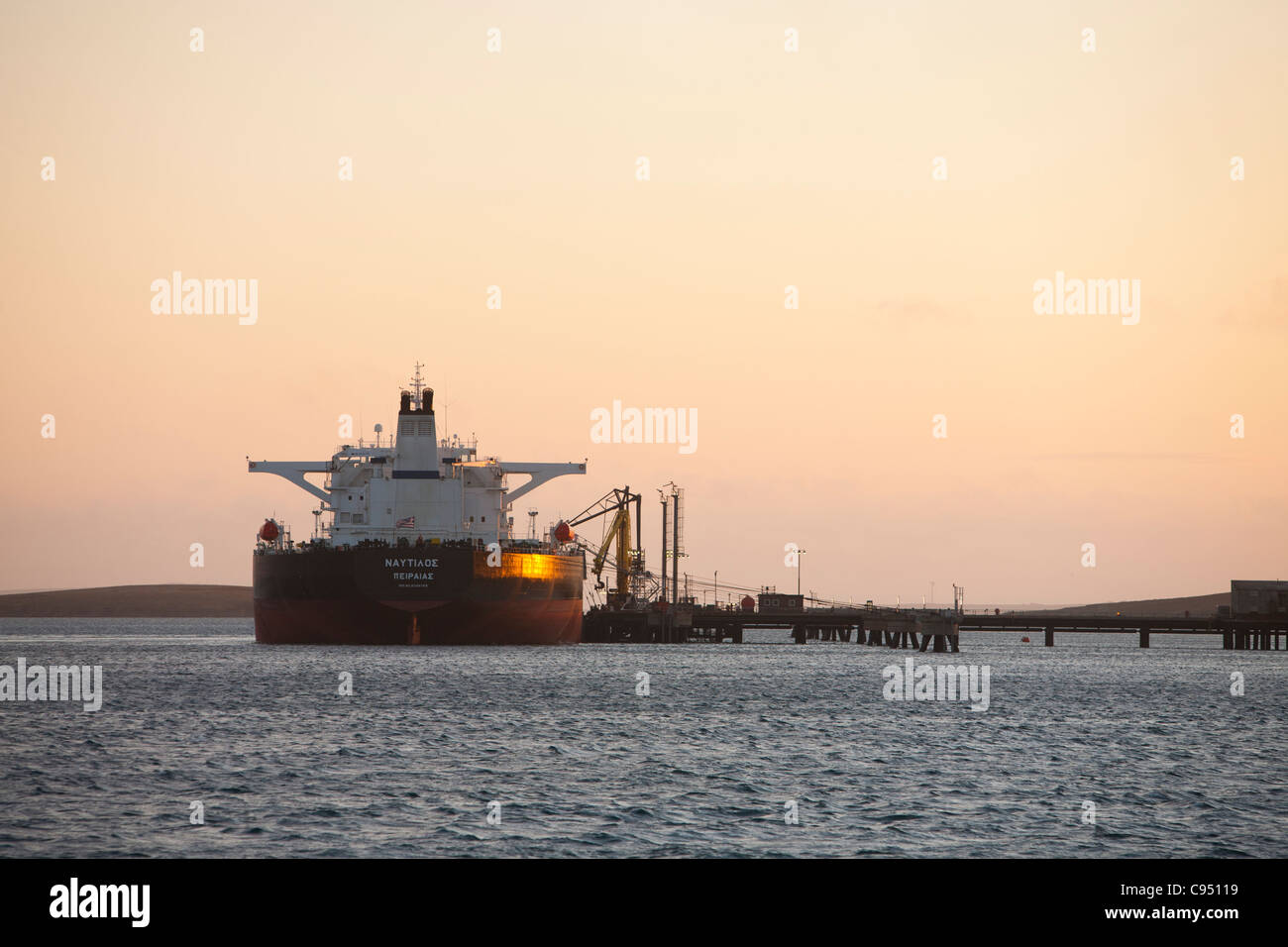 A Greek oil tanker docked at the Flotta oil terminal on the Idsland of ...