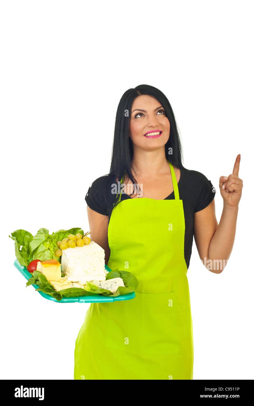 Smiling cheese maker woman holding plateau with different cheese ...