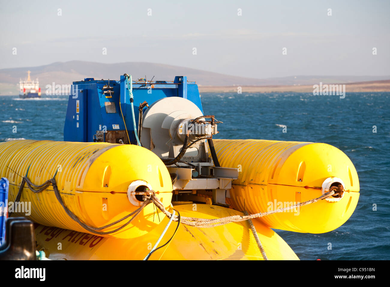 A Pelamis P2 wave energy generator on the dockside at Lyness on Hoy ...