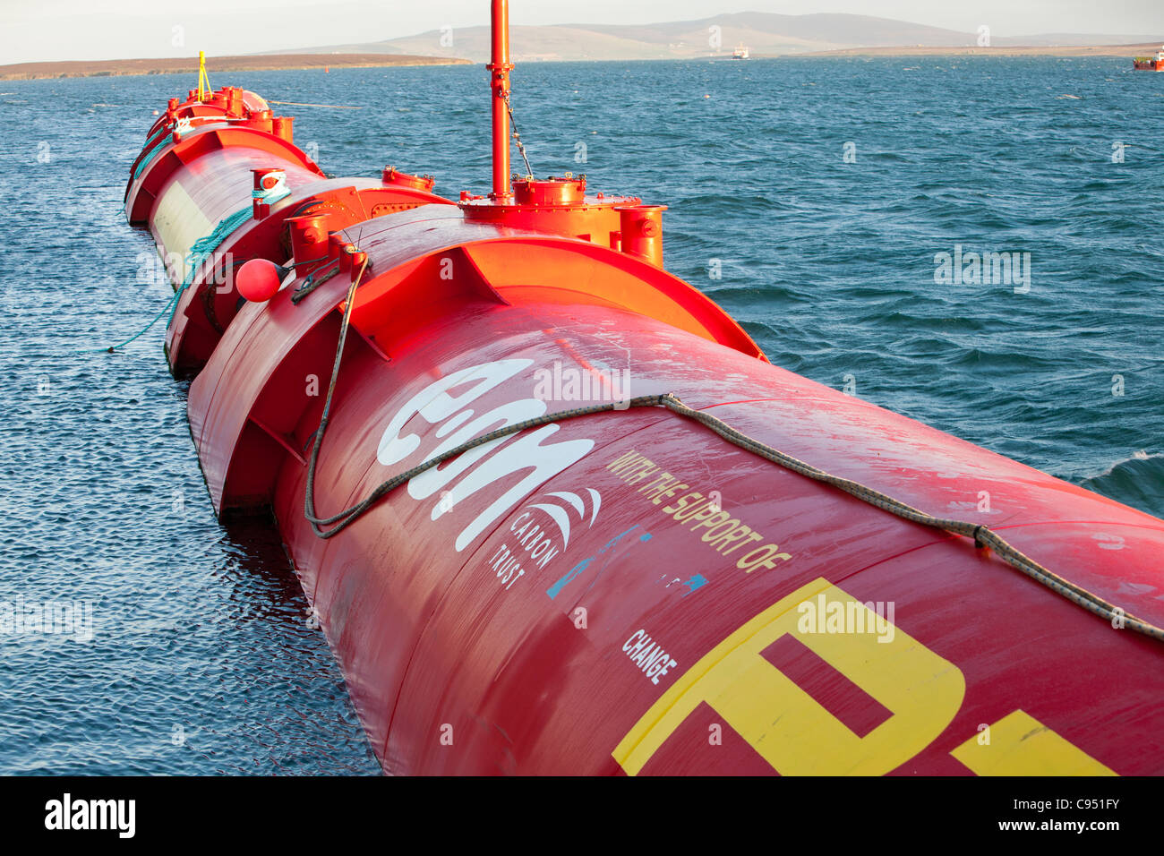 A Pelamis P2 wave energy generator on the dockside at Lyness on Hoy ...