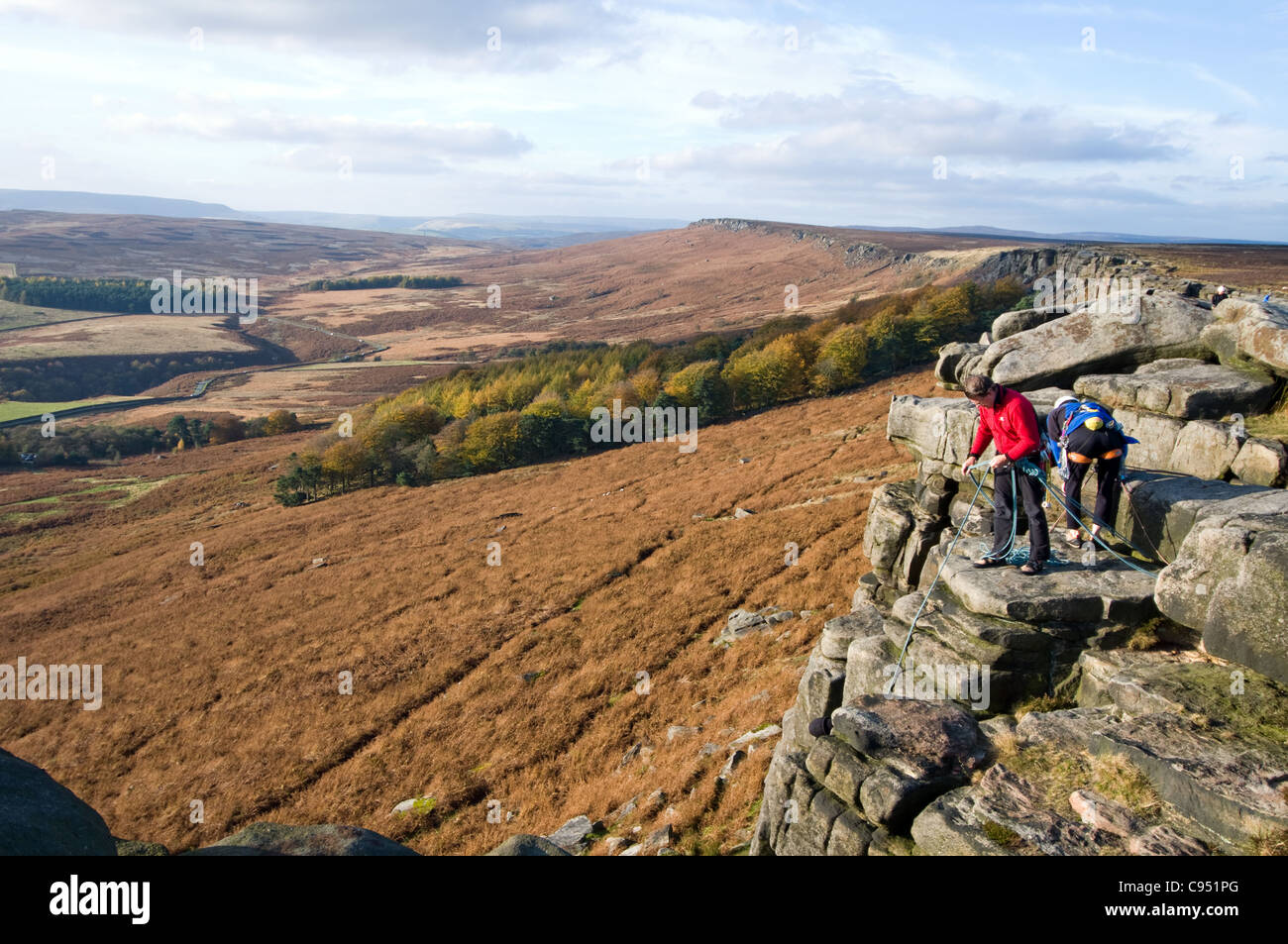 Rock Climbers on the top of Stanage Edge in the Peak District National ...