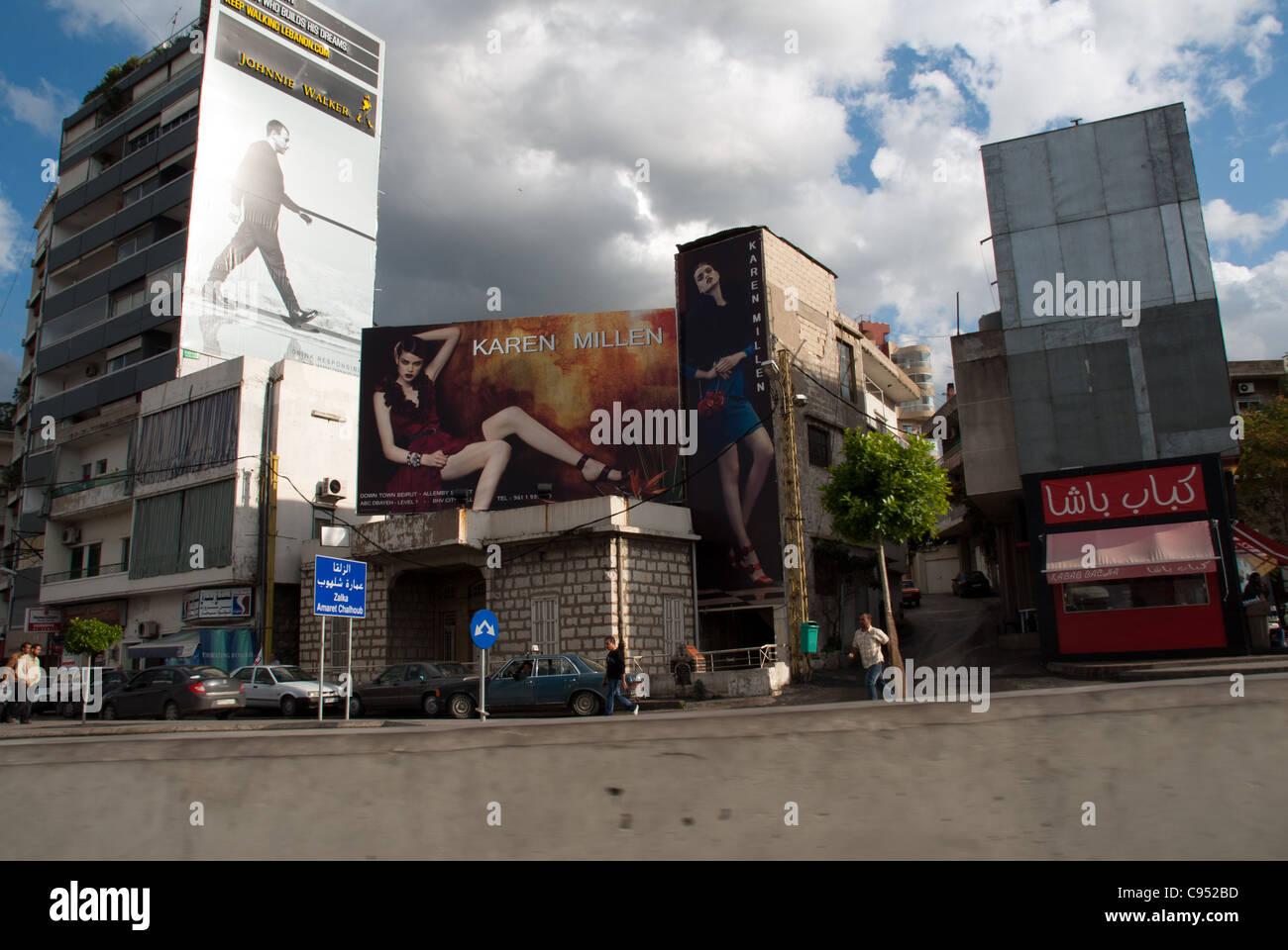 billboards adorn the facades of buildings in concrete Beirut Lebanon ...