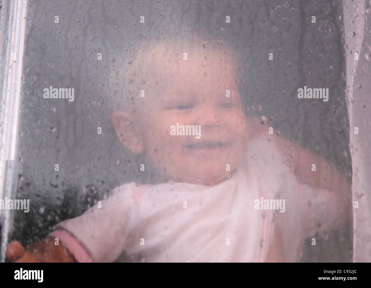 Girl watching the rain hi-res stock photography and images - Alamy