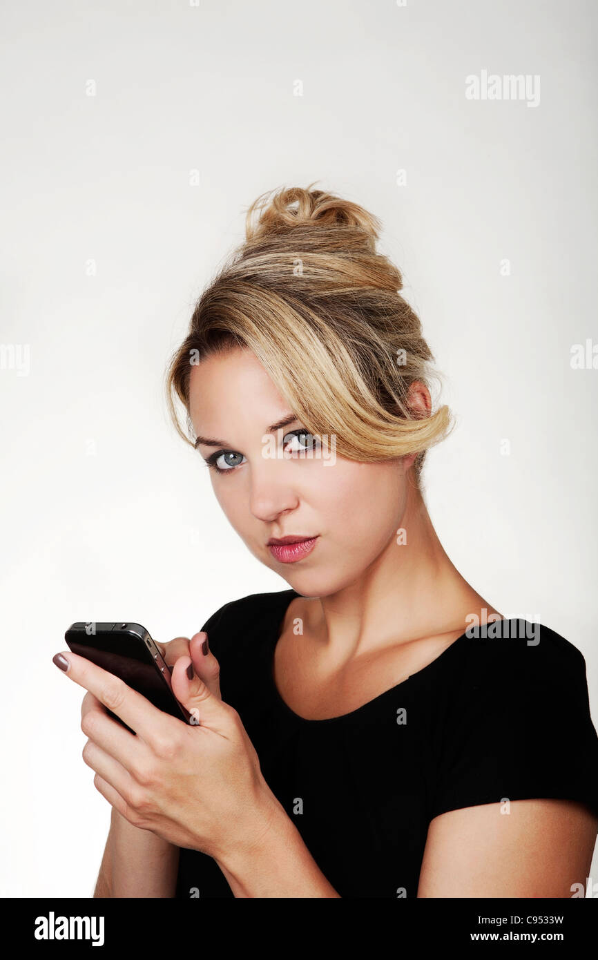 woman texting on her phone Stock Photo - Alamy