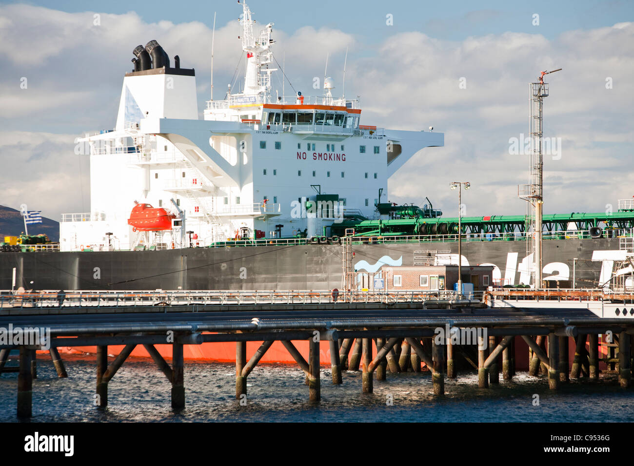 An oil tanker loading with crude oil at the Flotta oil terminal in the ...