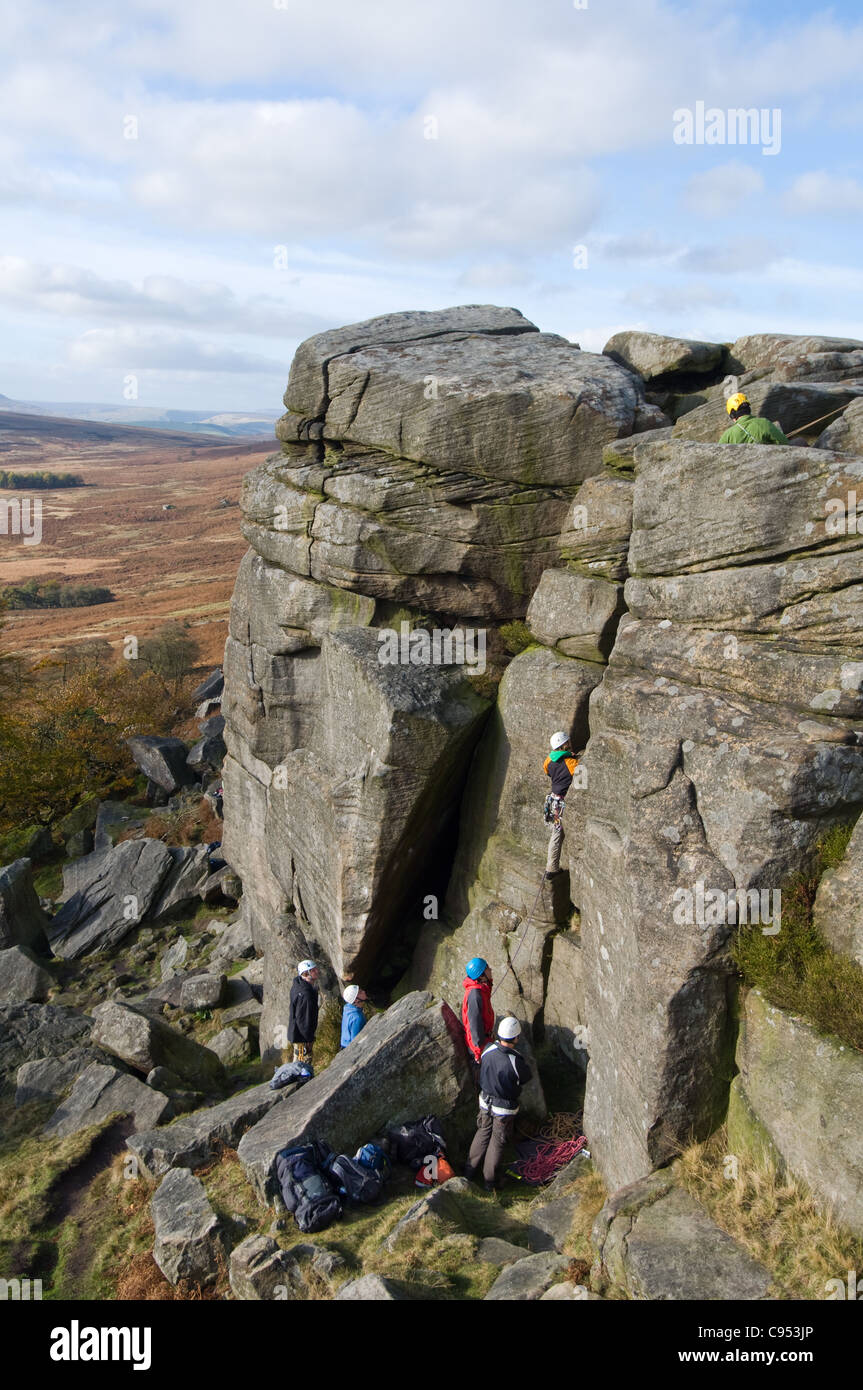 Rock Climbers on the top of Stanage Edge in the Peak District National ...