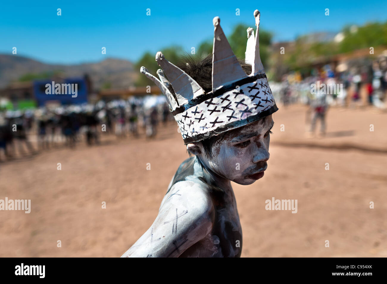 A Cora Indian boy, wearing a paper crown, dances during the sacred ...