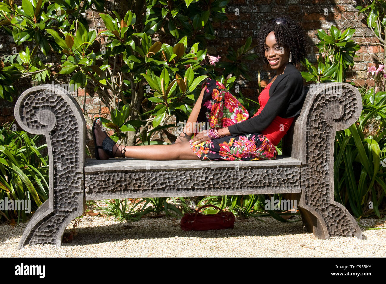 Black slim Zambian women smiling castle grounds Stock Photo - Alamy
