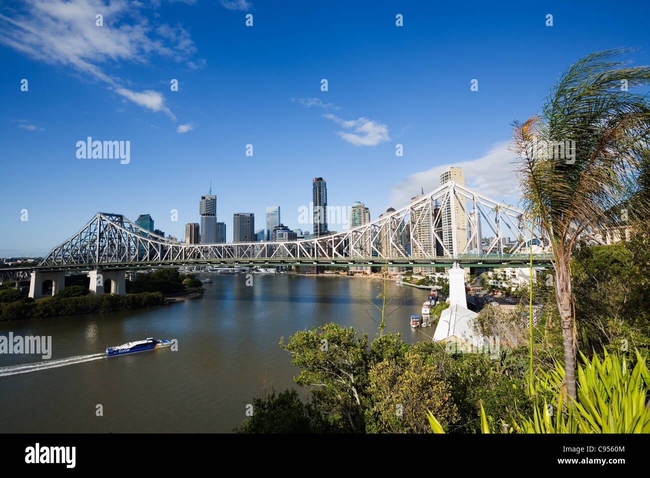 A Citycat ferry cruises beneath the Story Bridge in Brisbane ...