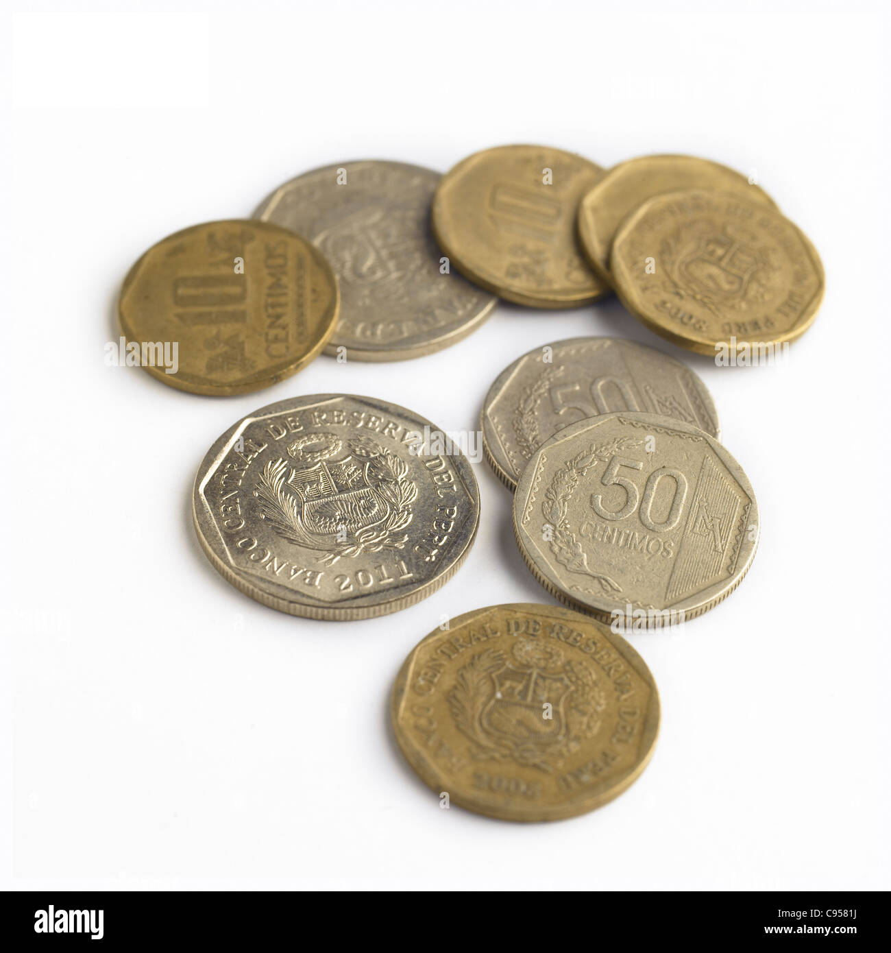 Peruvian Centimo coins on a white background Stock Photo - Alamy