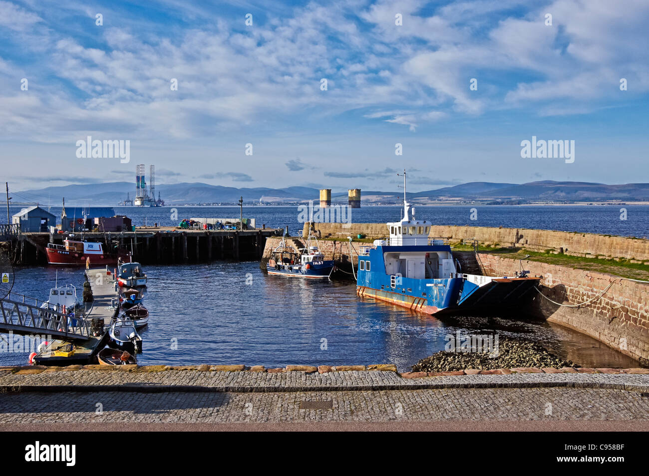 Nigg-Cromarty ferry Cromarty Queen & fishing boat in Cromarty Harbour ...