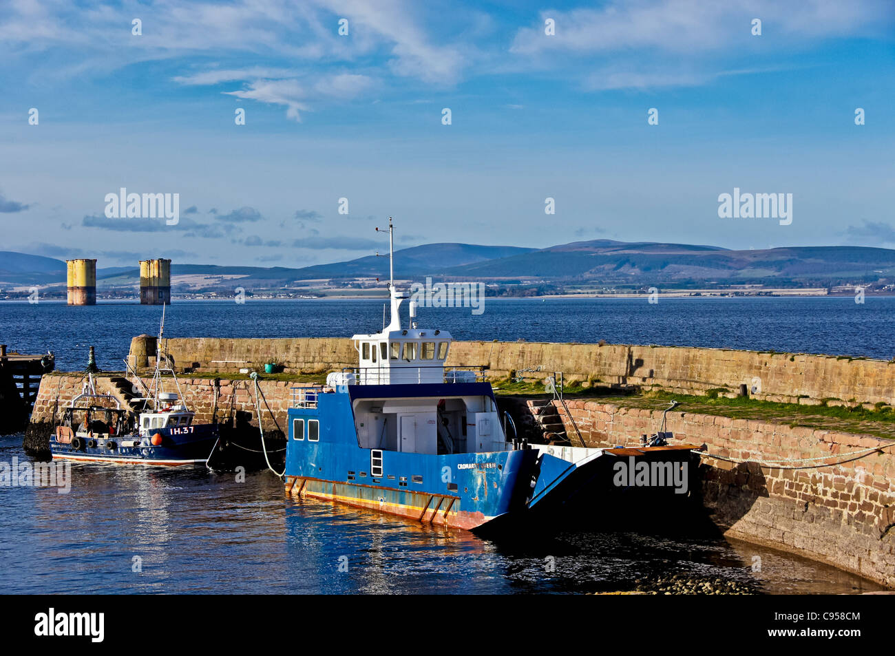 Nigg-Cromarty ferry Cromarty Queen & fishing boat in Cromarty Harbour ...