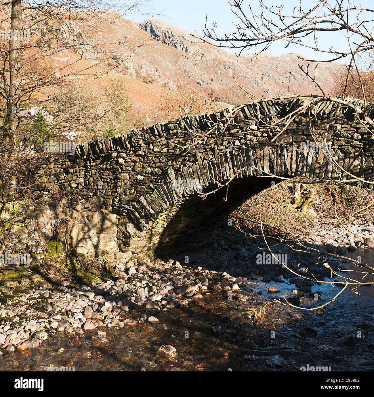 Old Lakeland Stone Packhorse Bridge over Mickleden Beck near Old ...