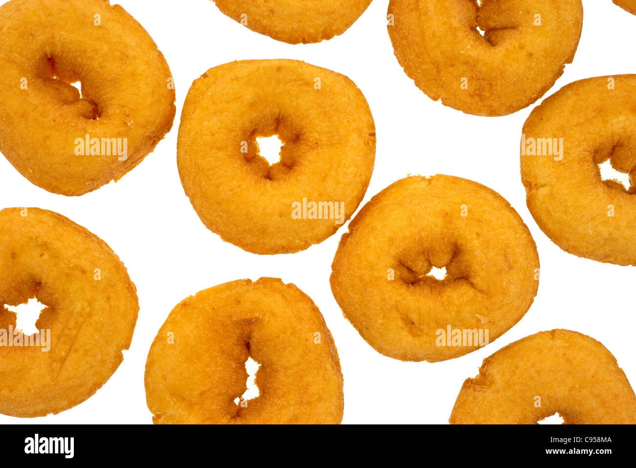 Small doughnuts on white background Stock Photo - Alamy