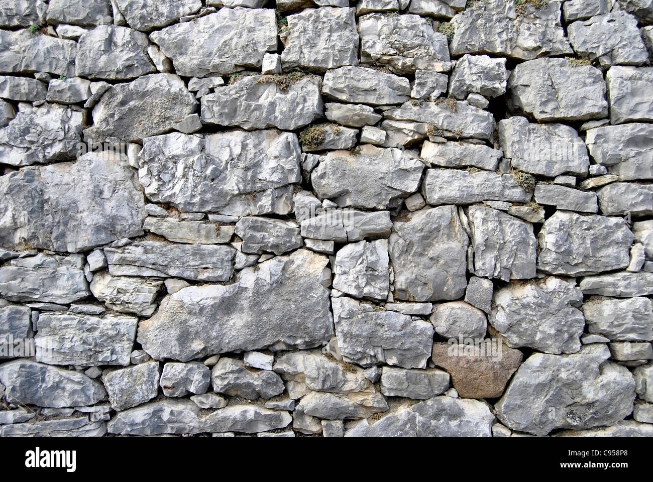 wall made from rock Stock Photo - Alamy