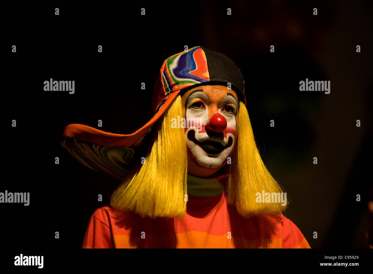 A clown attends the 16th International Clown Convention organized by ...