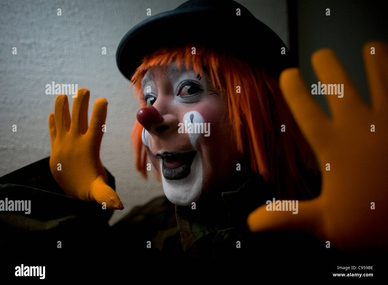 A clown shows his hands during the 16th International Clown Convention ...