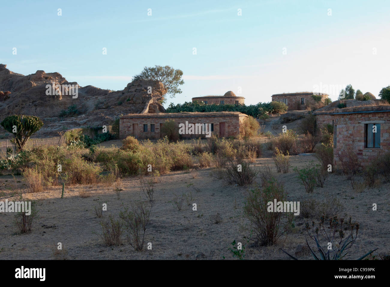 View of the stone-built bungalows at Gheralta Lodge near the village of ...