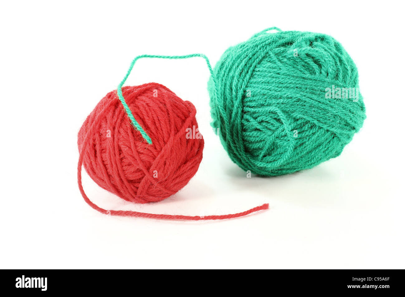 colorful balls of yarn in the colors red and green Stock Photo - Alamy
