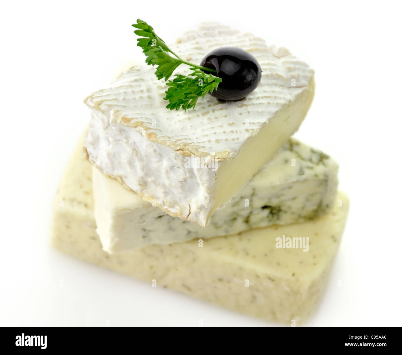A Stack Of Different Kinds Of Cheese On White Background Stock Photo ...