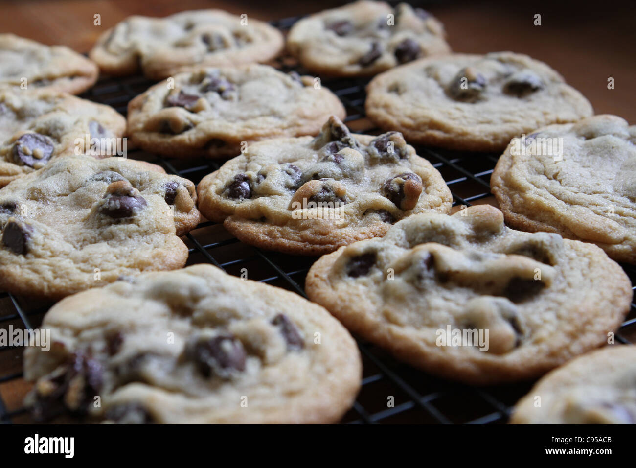 Chocolate chip cookies cooling on a rack Stock Photo - Alamy