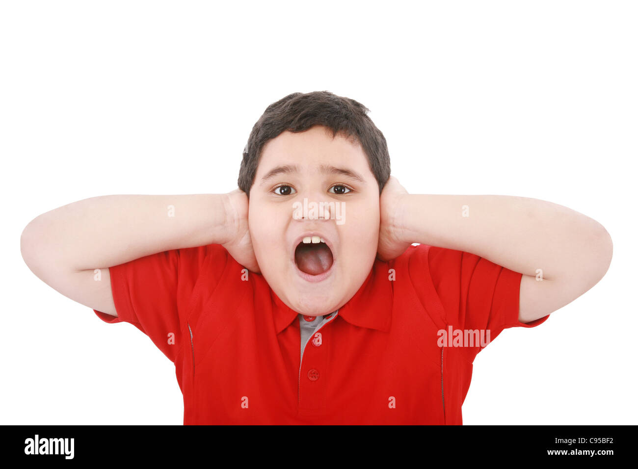 Horizontal portrait of a young boy yelling Stock Photo - Alamy