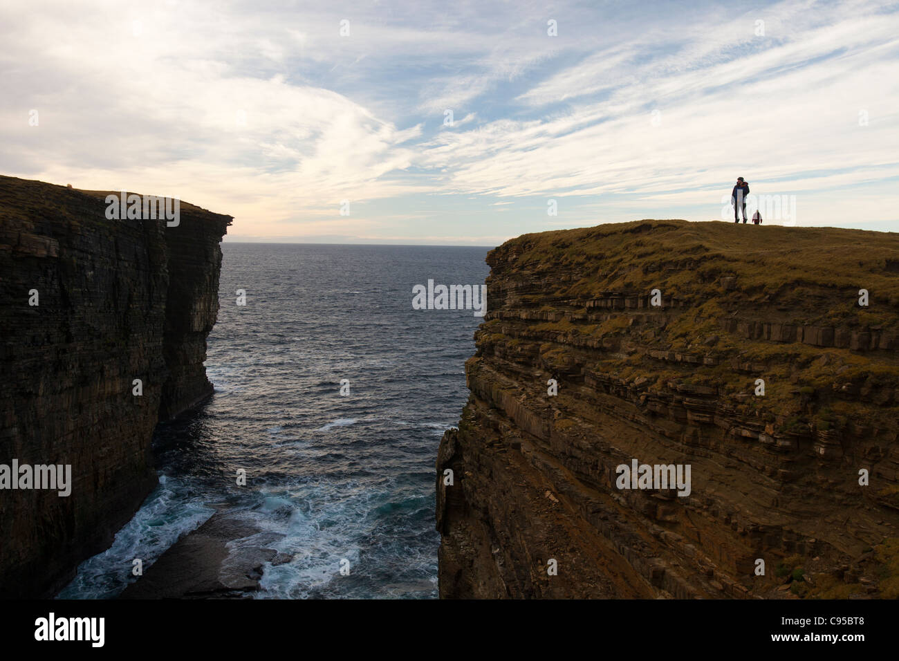 A geo, formed by weathering of the sandstone sea cliffs north of ...