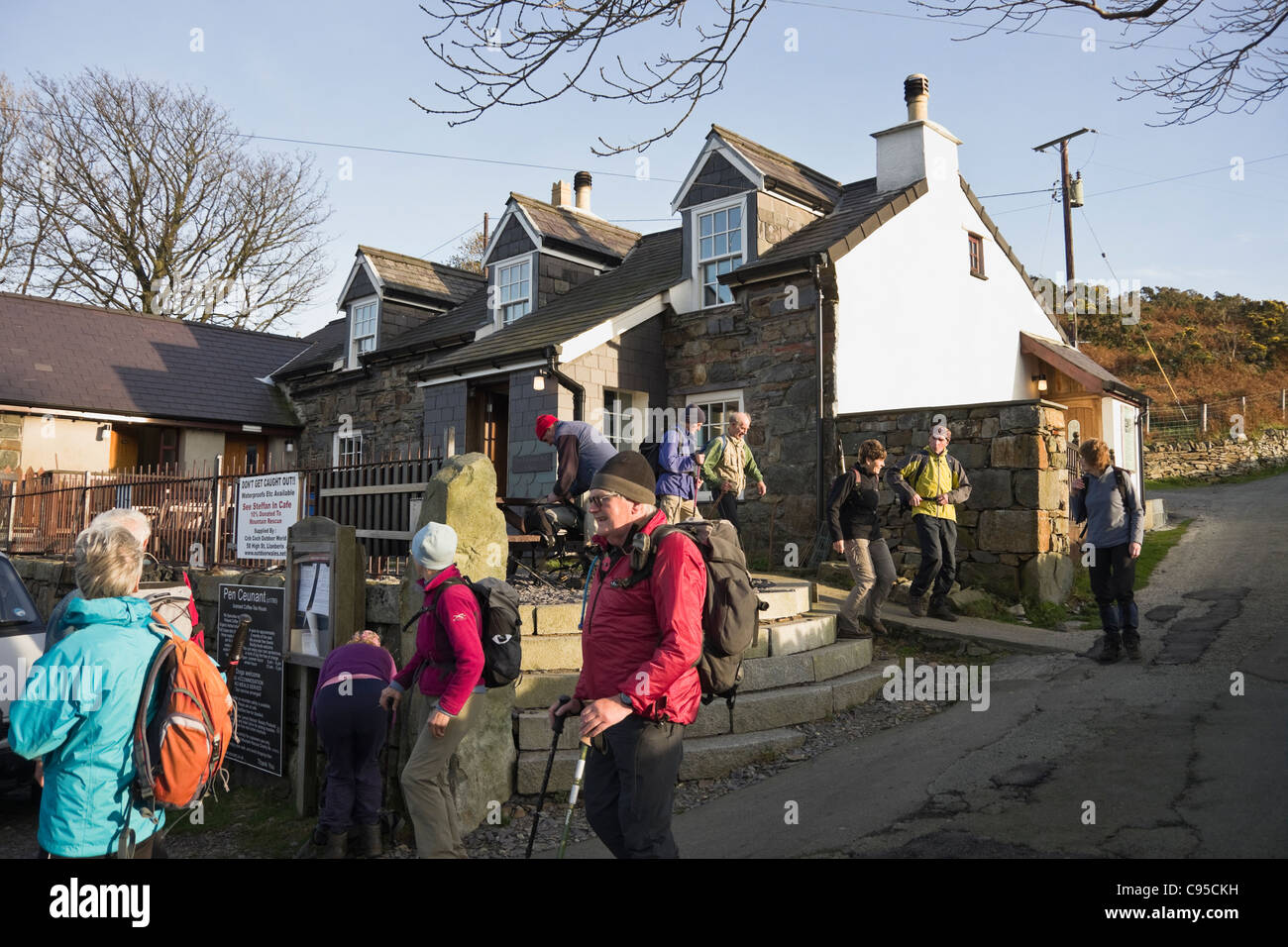 Ramblers outside Pen Ceunant cafe on the path to Snowdon in Snowdonia ...