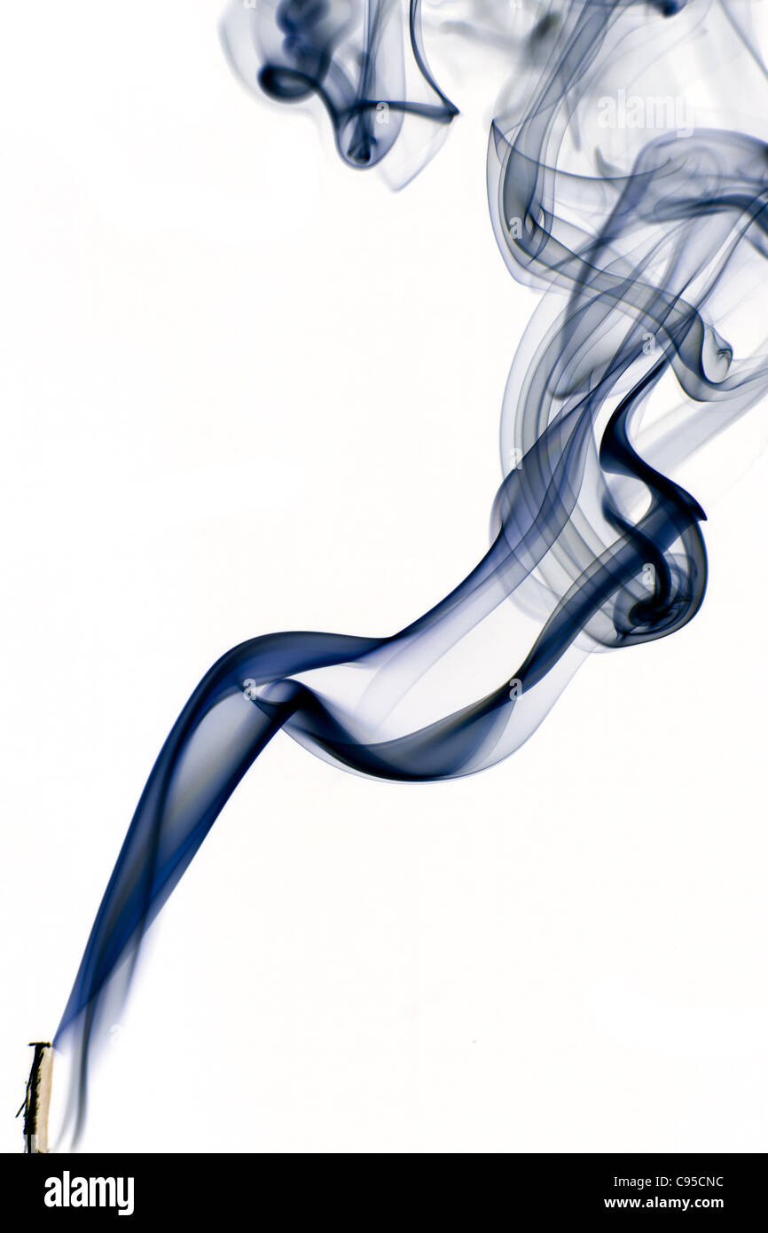 Incense stick smoke trail Stock Photo - Alamy